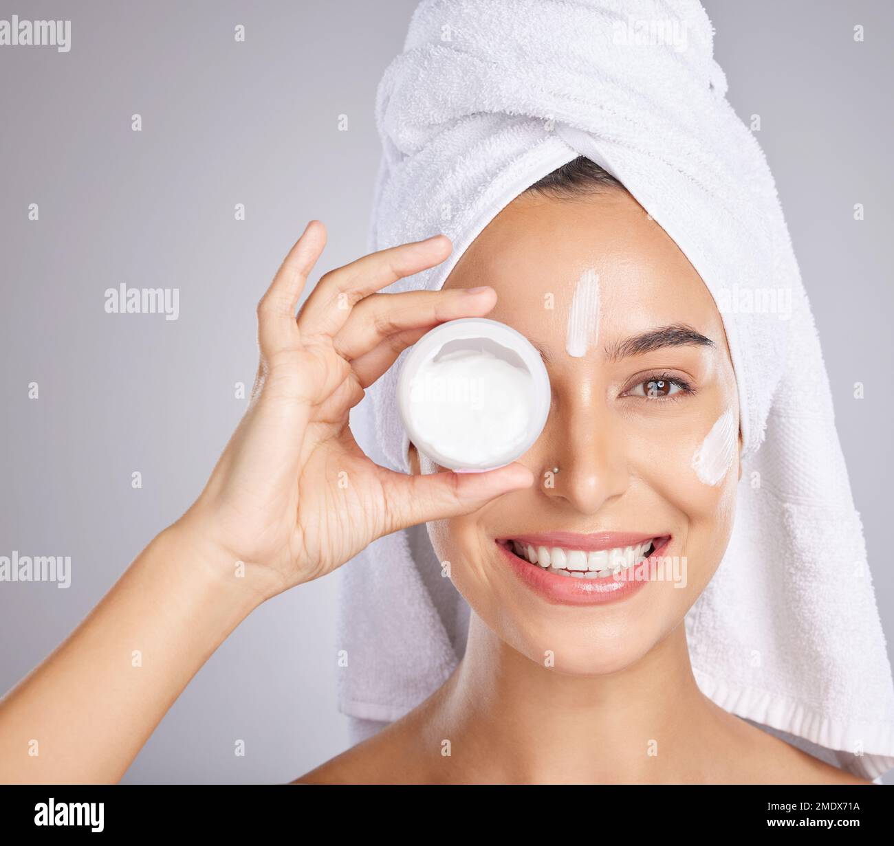Woman, skincare cream and studio portrait for wellness, health or ...