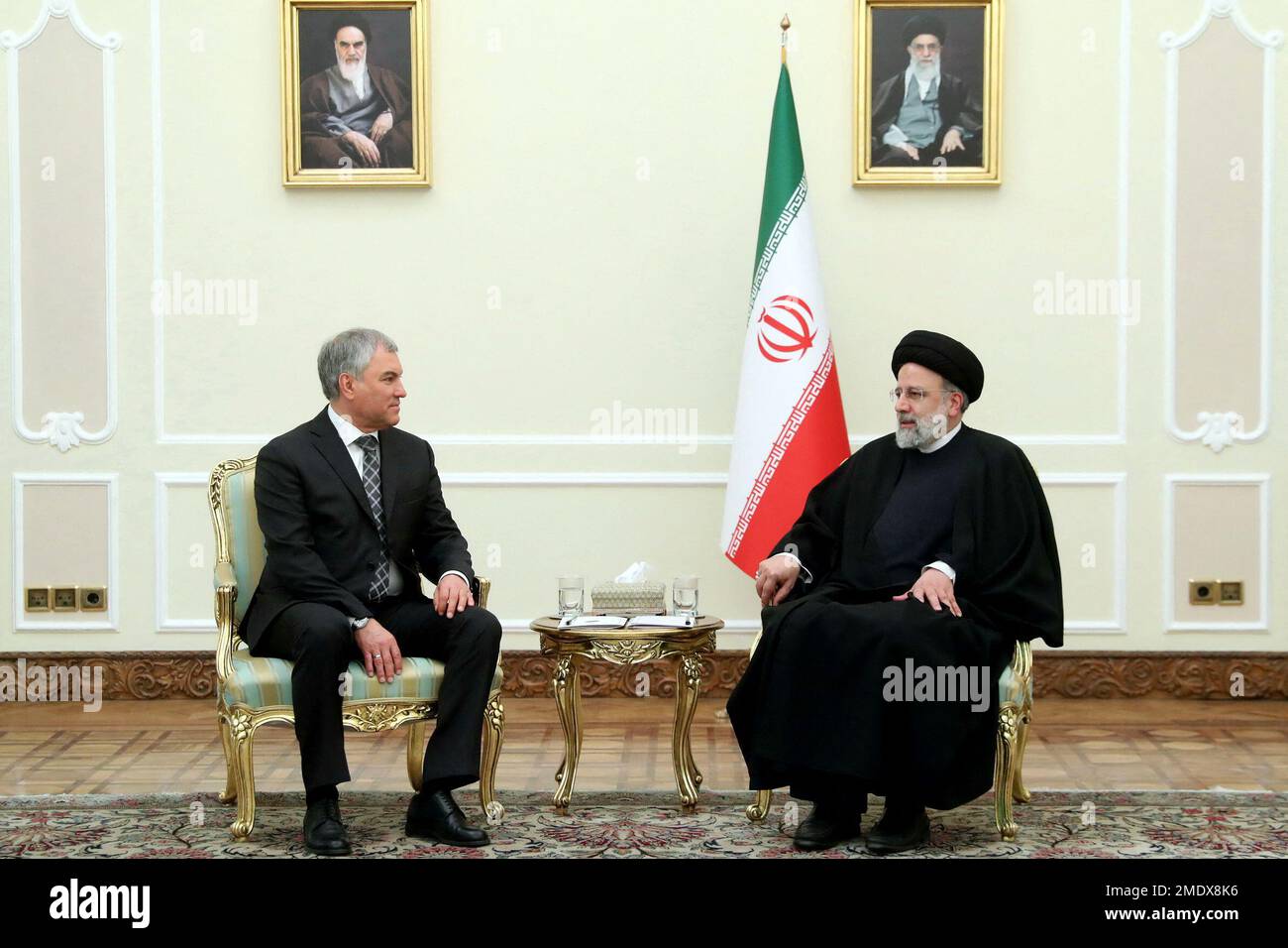 Iranian President Ebrahim Raisi (R) meets Russian State Duma ...
