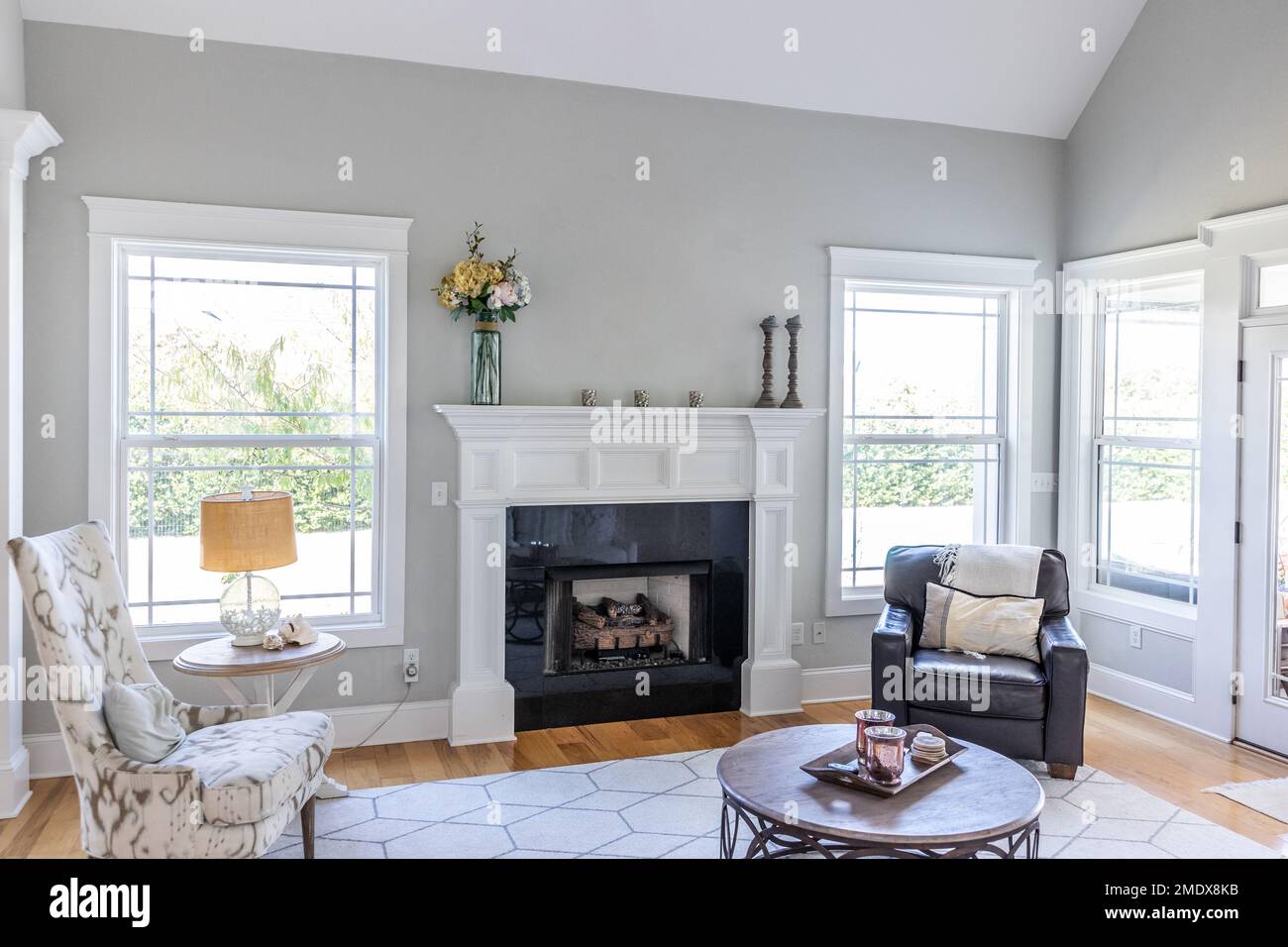 Den With Vaulted Ceiling Black Corbels In Living Room With Vaulted