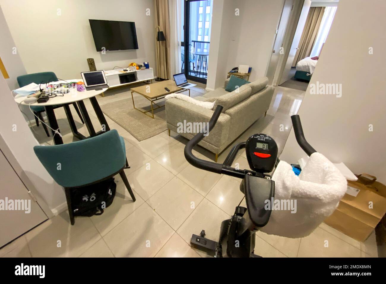 An exercise bike sits in a hotel isolation room in Sydney, Australia ...