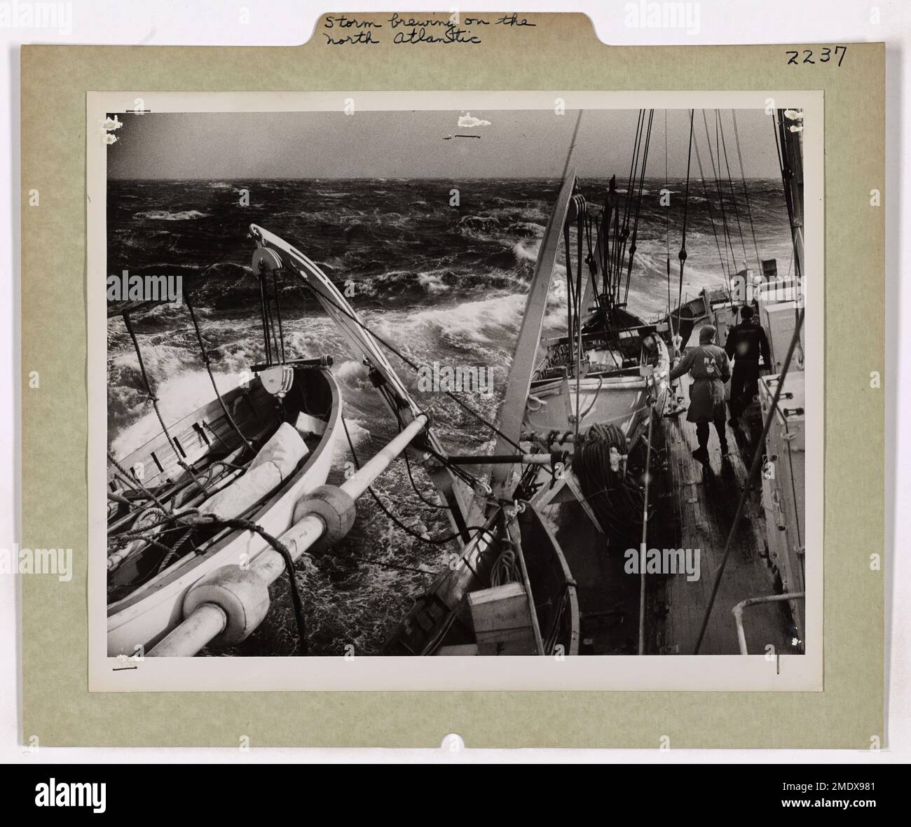 A Coast Guard combat cutter is seen battling through fierce waves of ...
