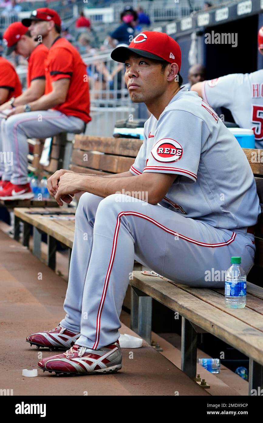 Cincinnati Reds left fielder Shogo Akiyama (4) sits on the bench during ...