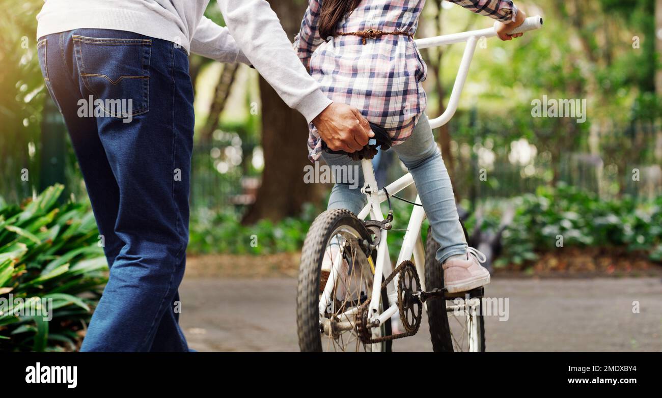 Your presence is pivotal in their development. Rearview shot of an unrecognizable little girl ...