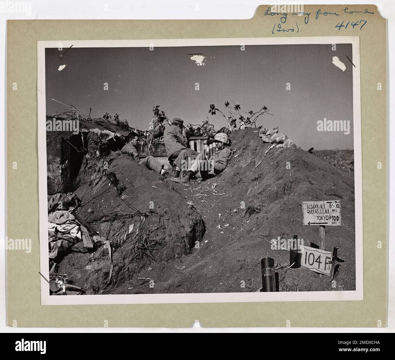 A Coast Guard photographer is seen crouching in a listening post on the ...