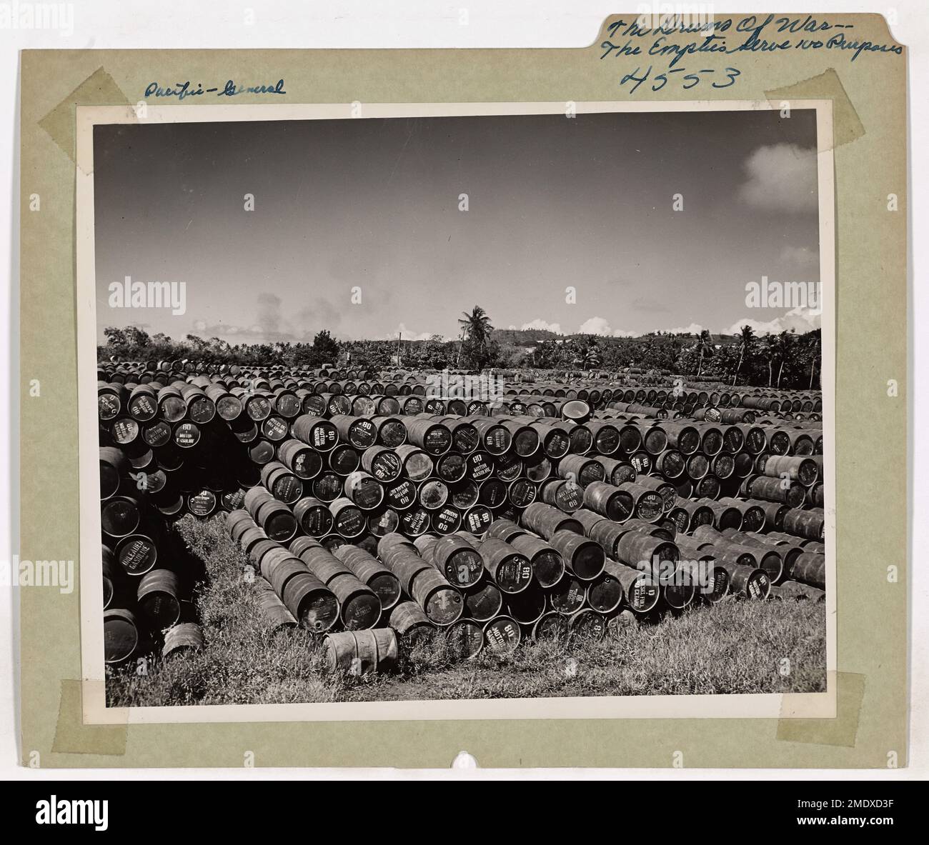 Empty oil drums, stacked in the thousands, serve various purposes on a ...