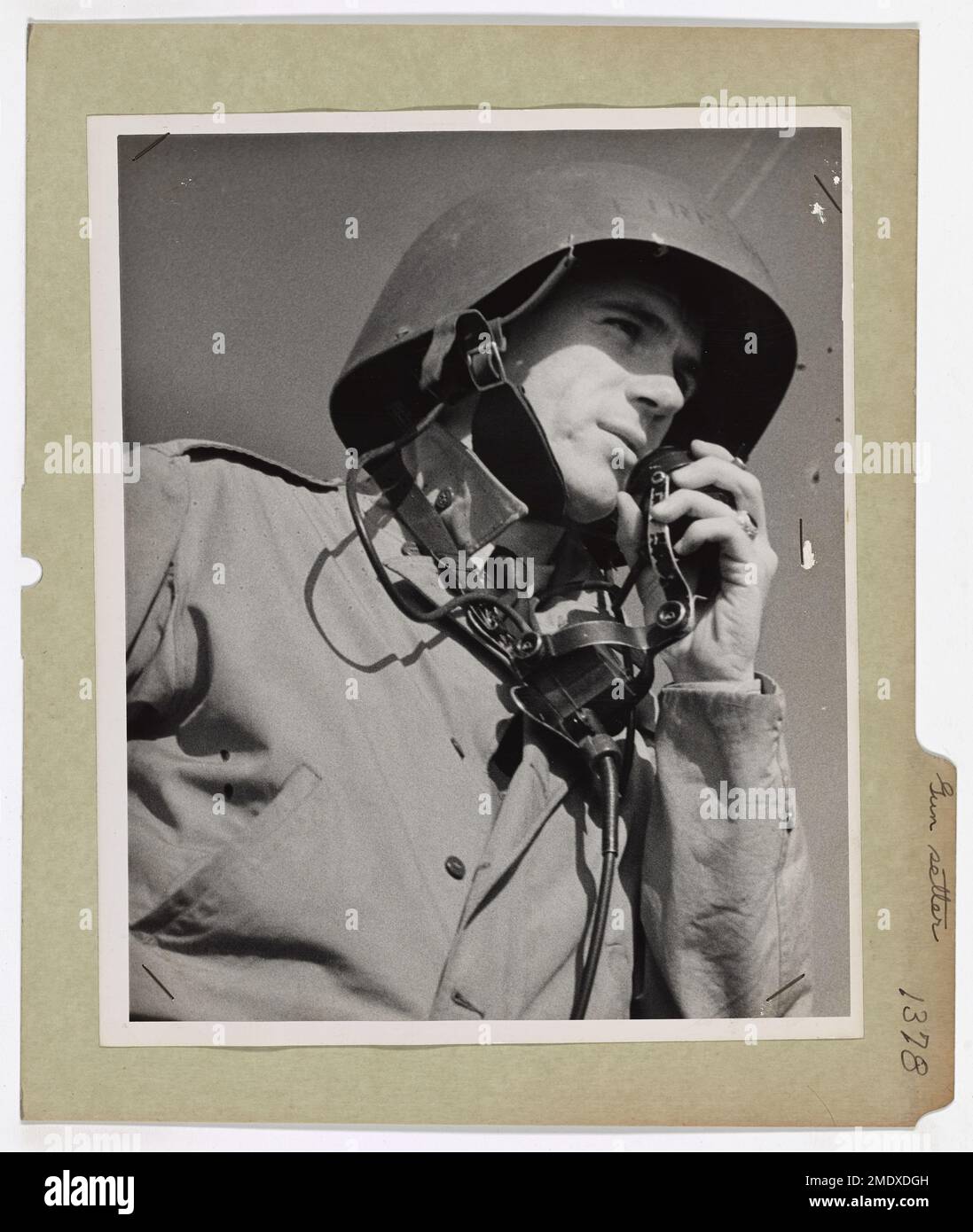 A Coast Guardsman, known as a gun-setter, practices finding the range ...