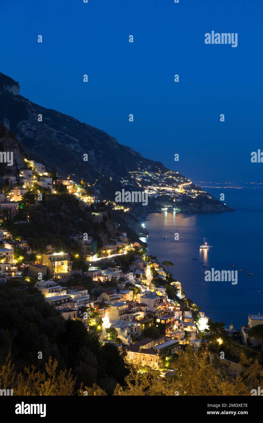View of cliffside Positano during the evening (blue hour), Amalfi Coast ...