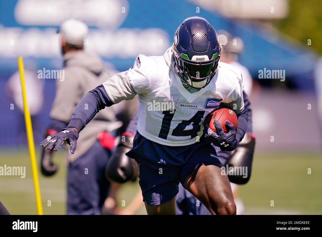 Seattle Seahawks wide receiver DK Metcalf runs through a drill during ...