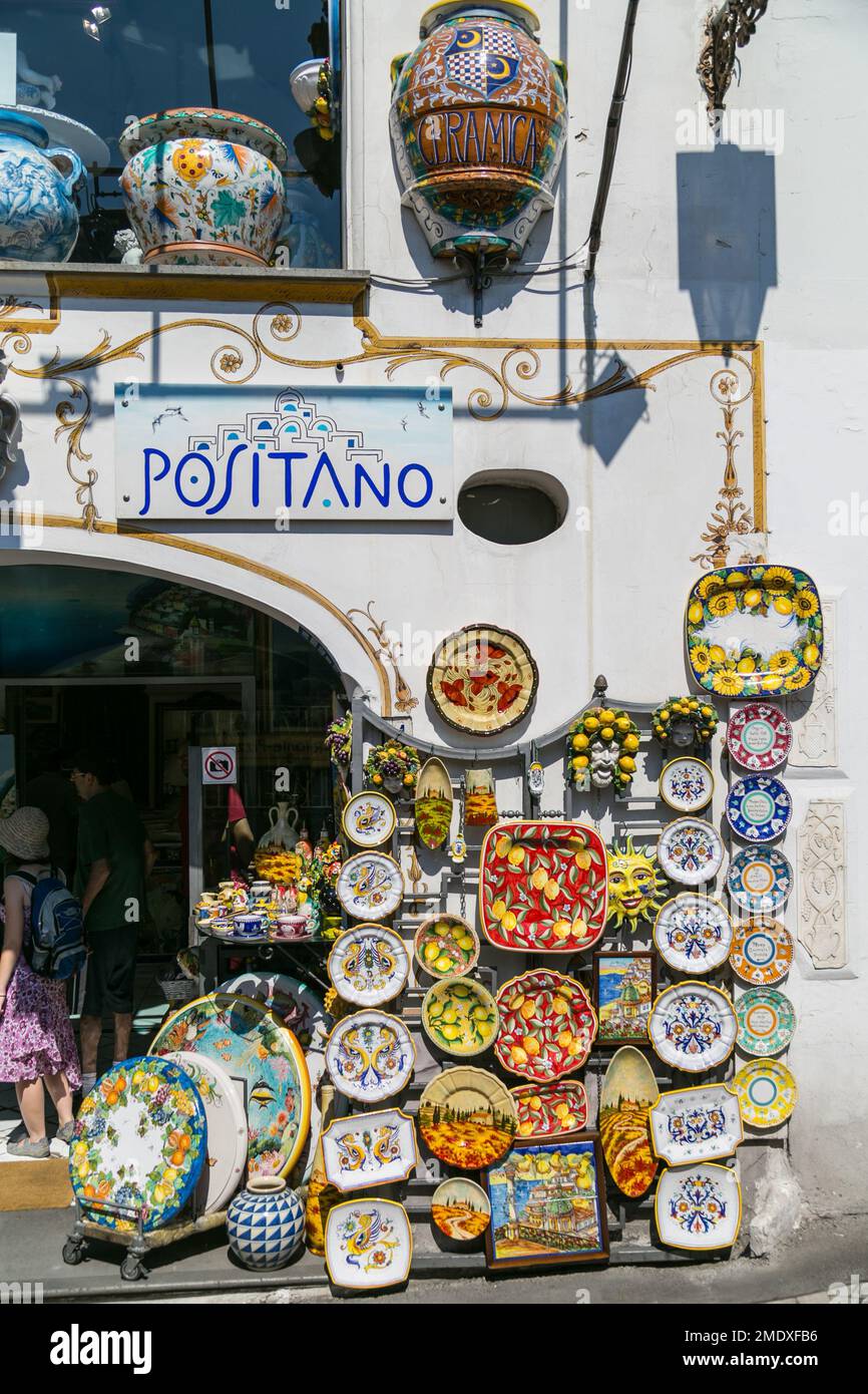 Hand-painted decorative plates hanging outside of ceramic shop in ...