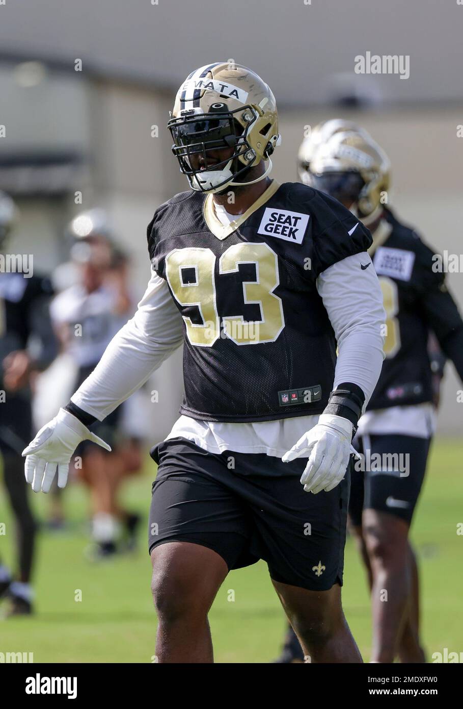 New Orleans Saints defensive tackle David Onyemata (93) stretches ...