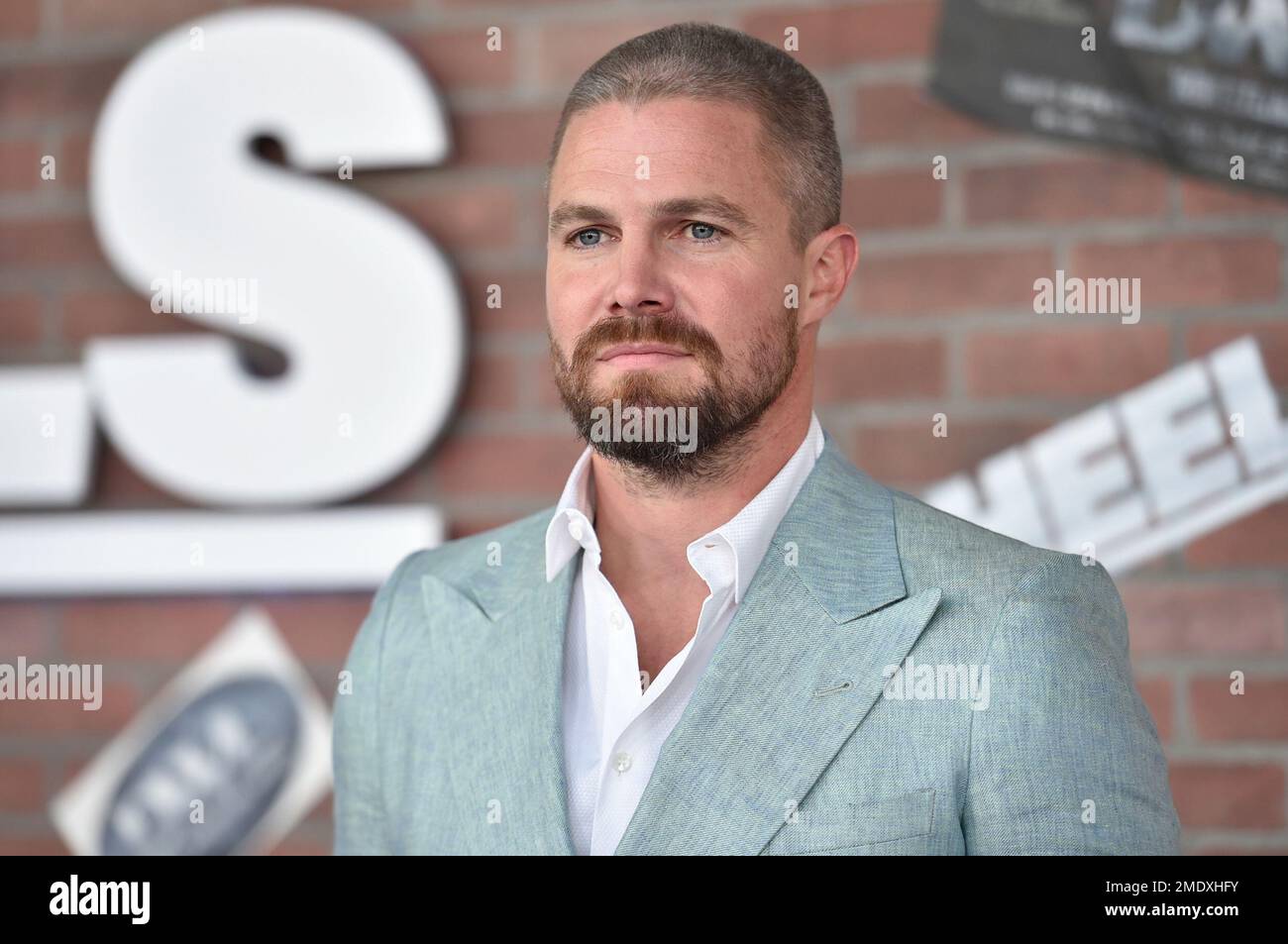 Stephen Amell arrives at the premiere of "Heels" on Tuesday, Aug. 10 ...
