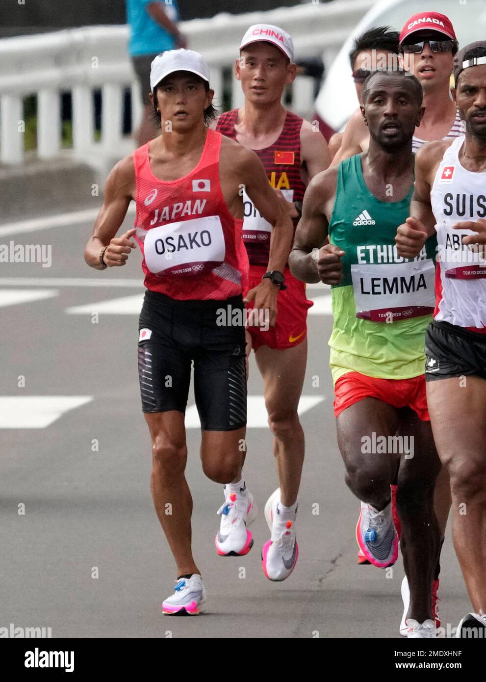 Suguru Osako, of Japan, competes during the men's marathon at the 2020 ...