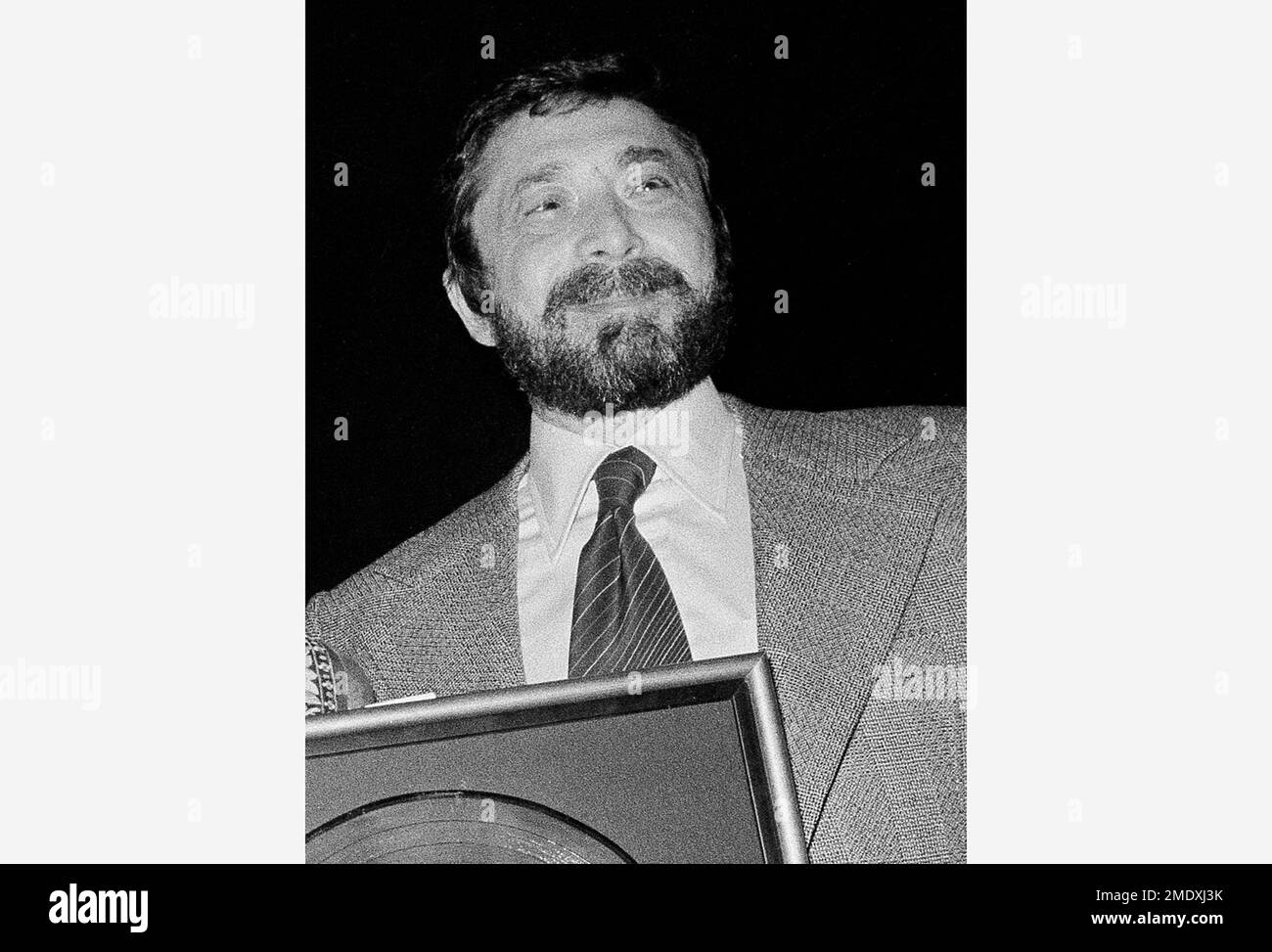 FILE - Walter Yetnikoff, president of CBS Records, presents gold ...