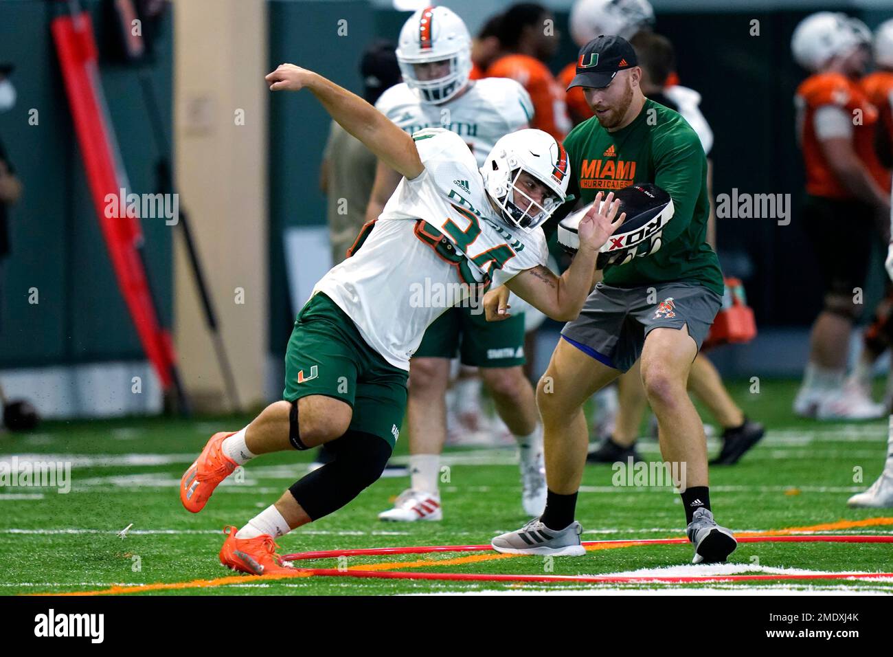 Miami linebacker Ryan Ragone (34) goes through a drill during NCAA ...