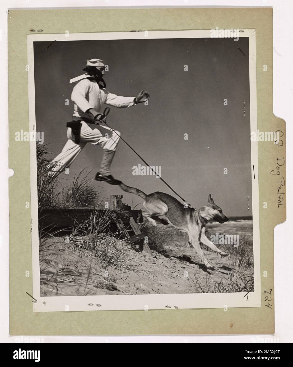 Coast Guard War Dog. This image depicts an armed Coast Guardsman and ...