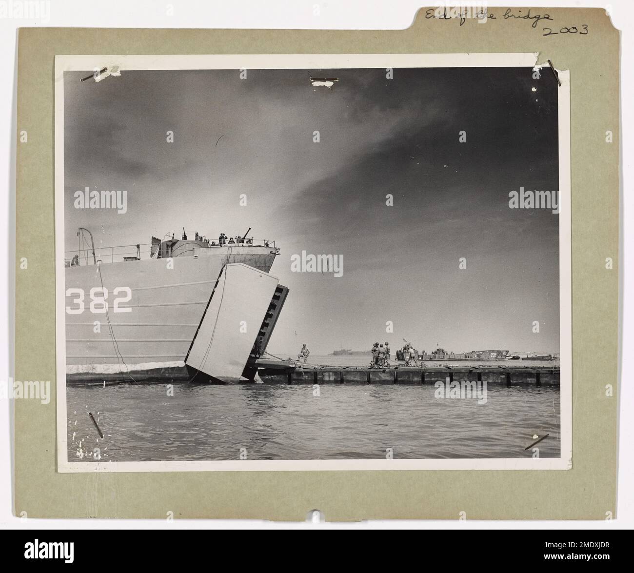 This photograph captures a U.S. Coast Guard manned LST (Landing Ship ...