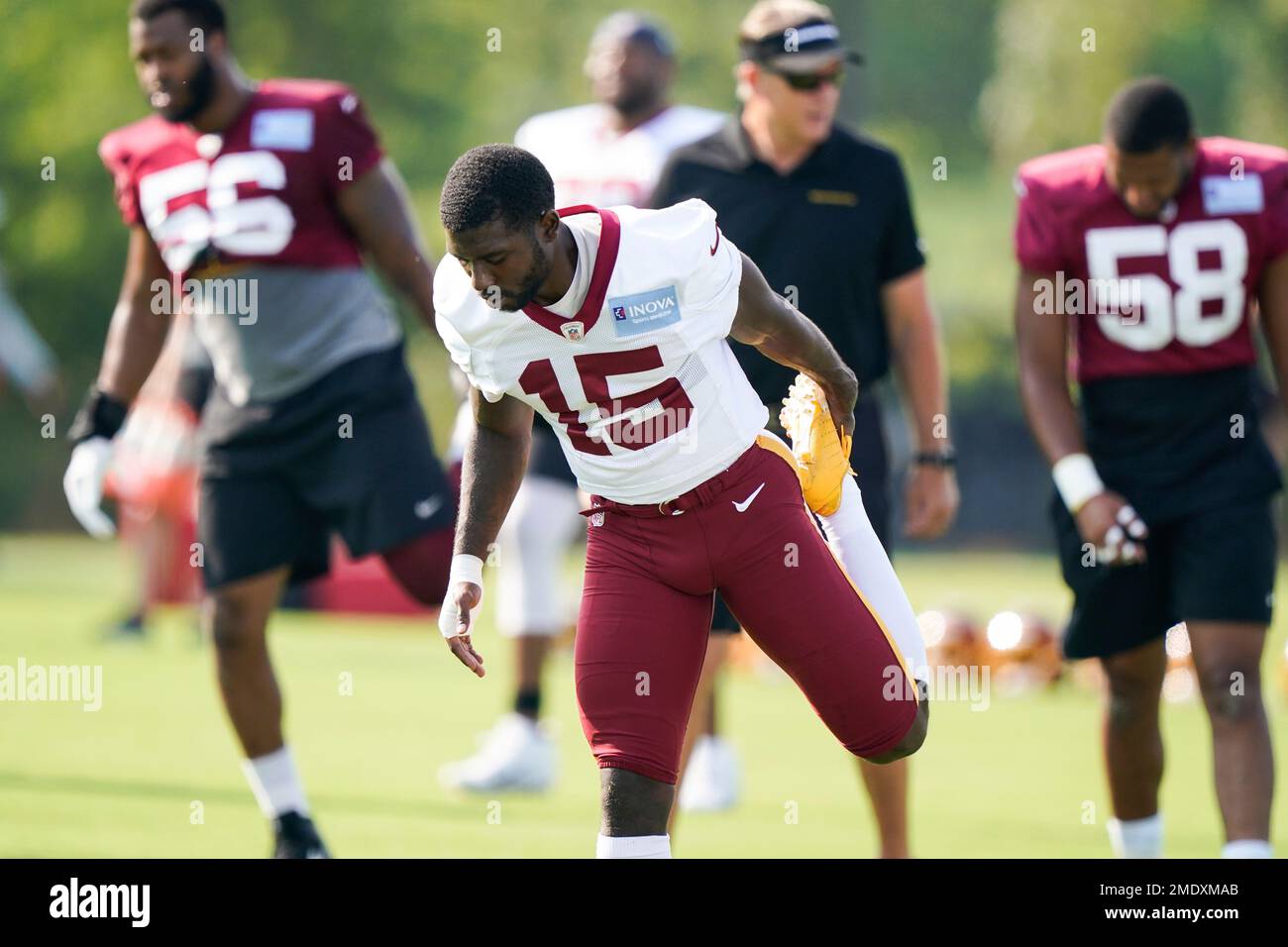 Washington Football Team wide receiver Steven Sims (15) stretches ...