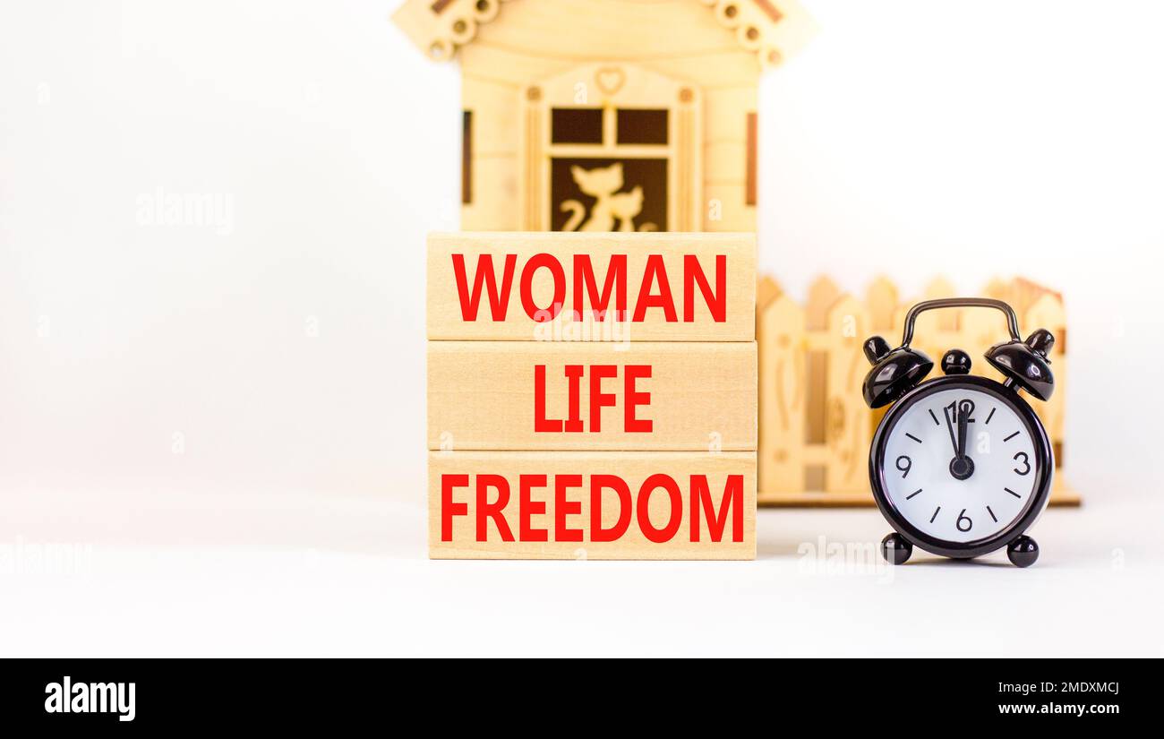 Woman life freedom symbol. Concept words Woman Life Freedom on wooden ...