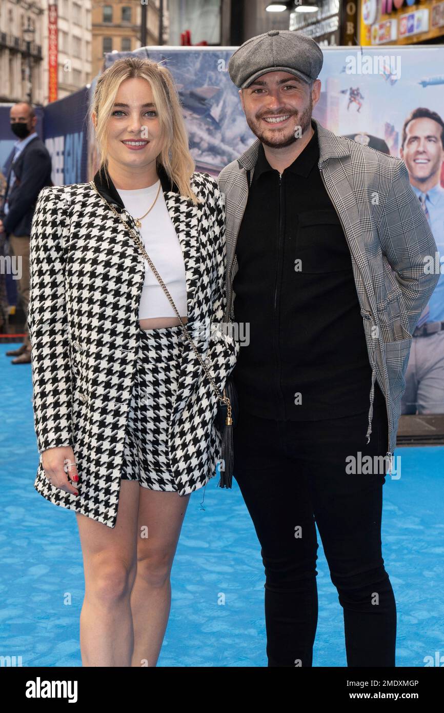 Sian Welby, left, and Junno Turner pose for photographers upon arrival ...