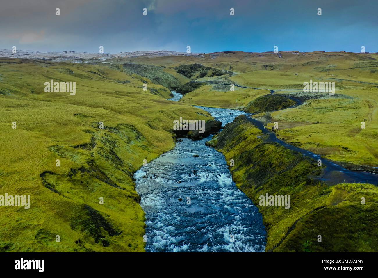A mesmerizing aerial view of Skogafoss waterfall stream captured on a ...