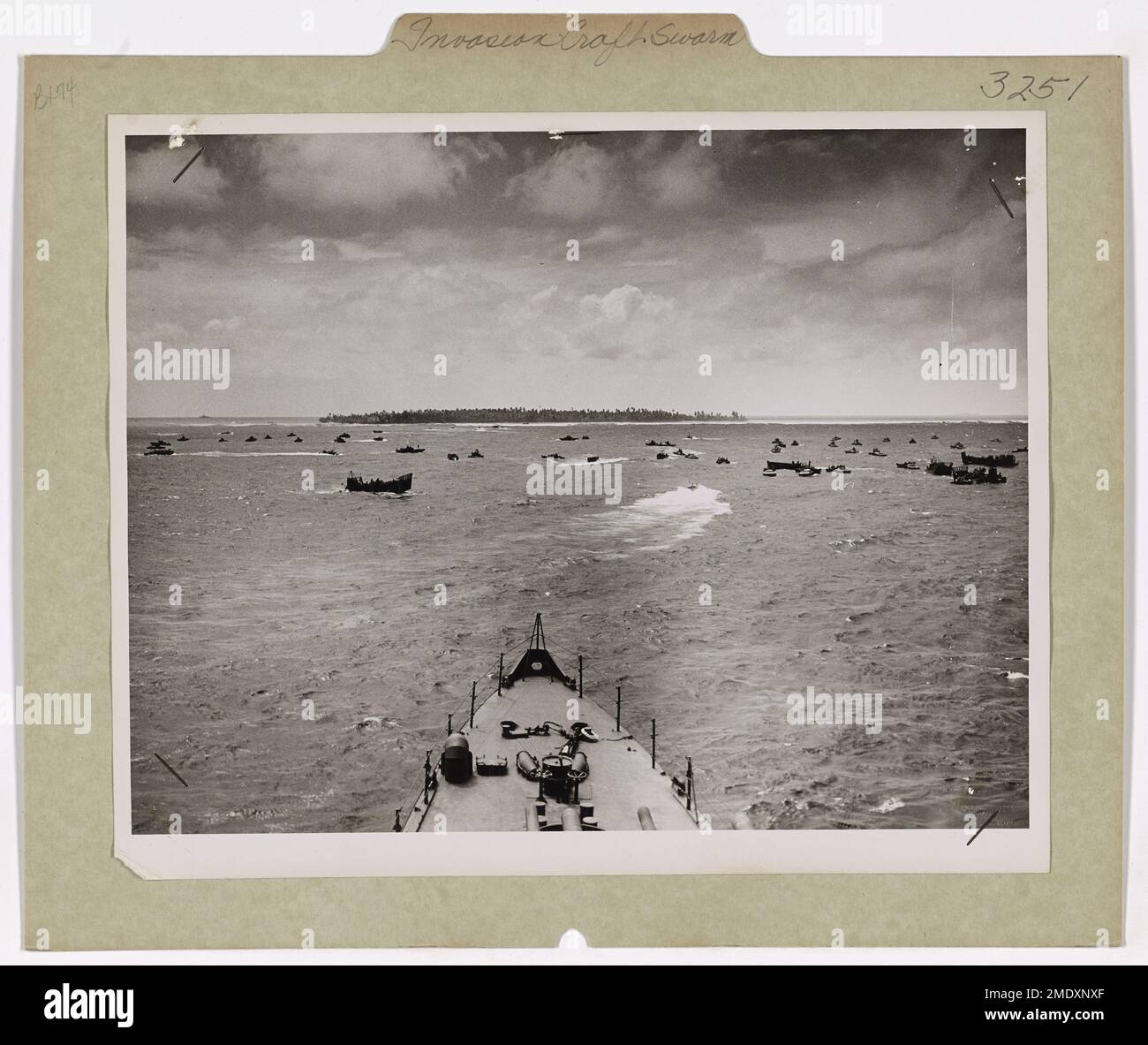 Coast Guard and Navy landing craft rush to the shores of Namur and Roi ...