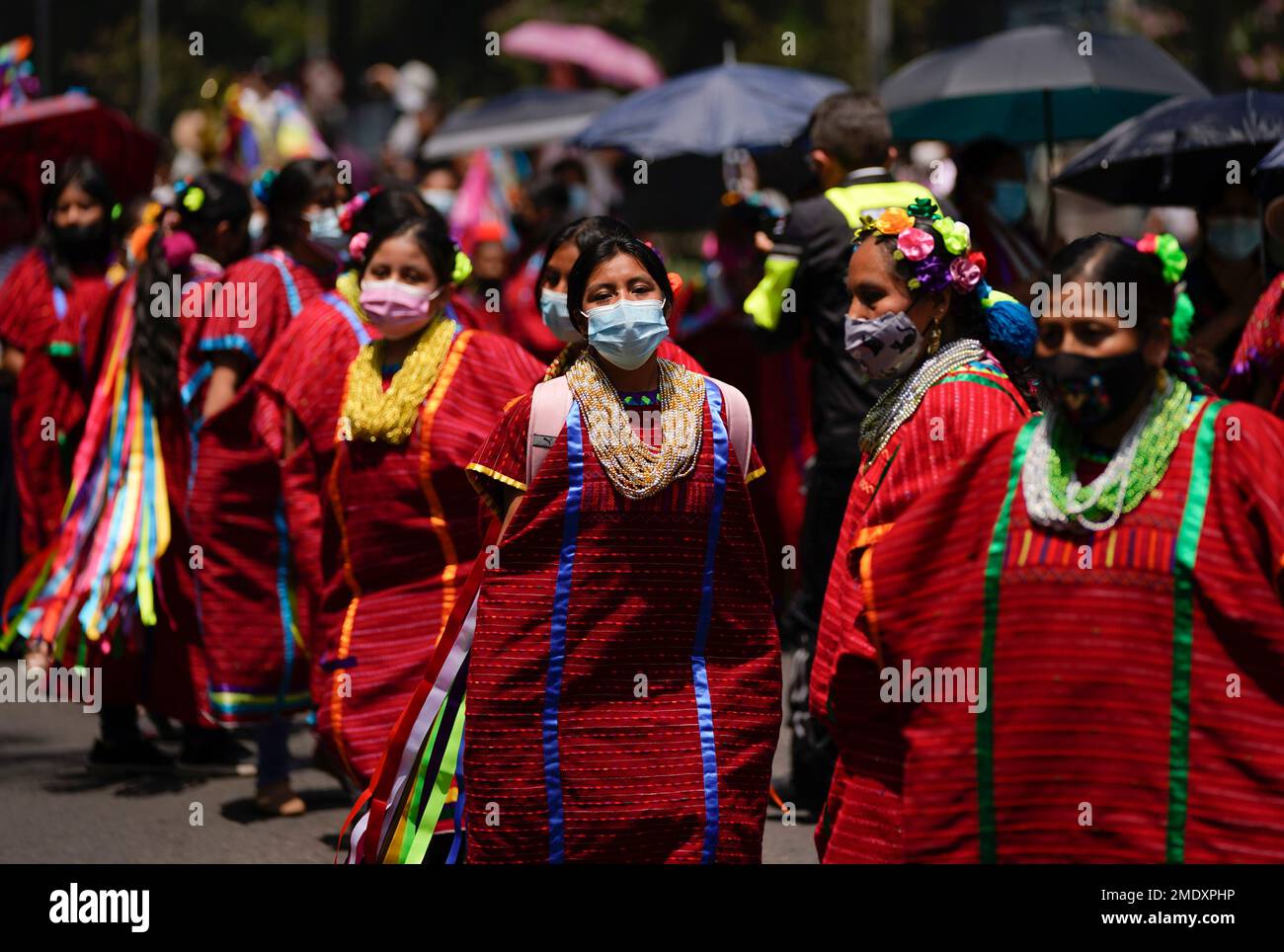 Triquis Indigenous women who live in Mexico City, dance during a march ...