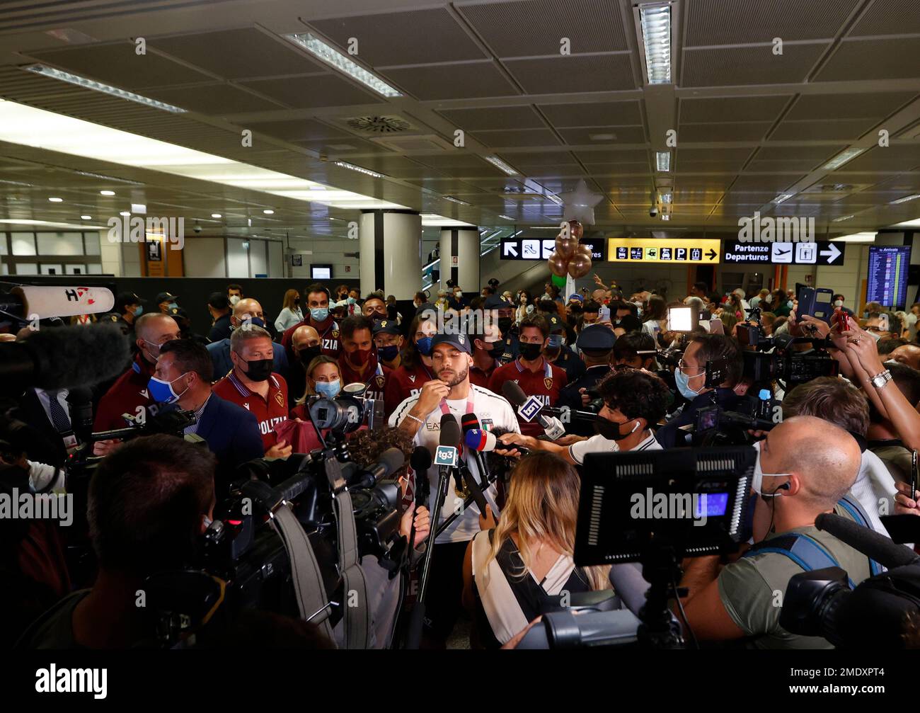 Italian sprinter Marcell Jacobs meets reporters after disembarking from ...