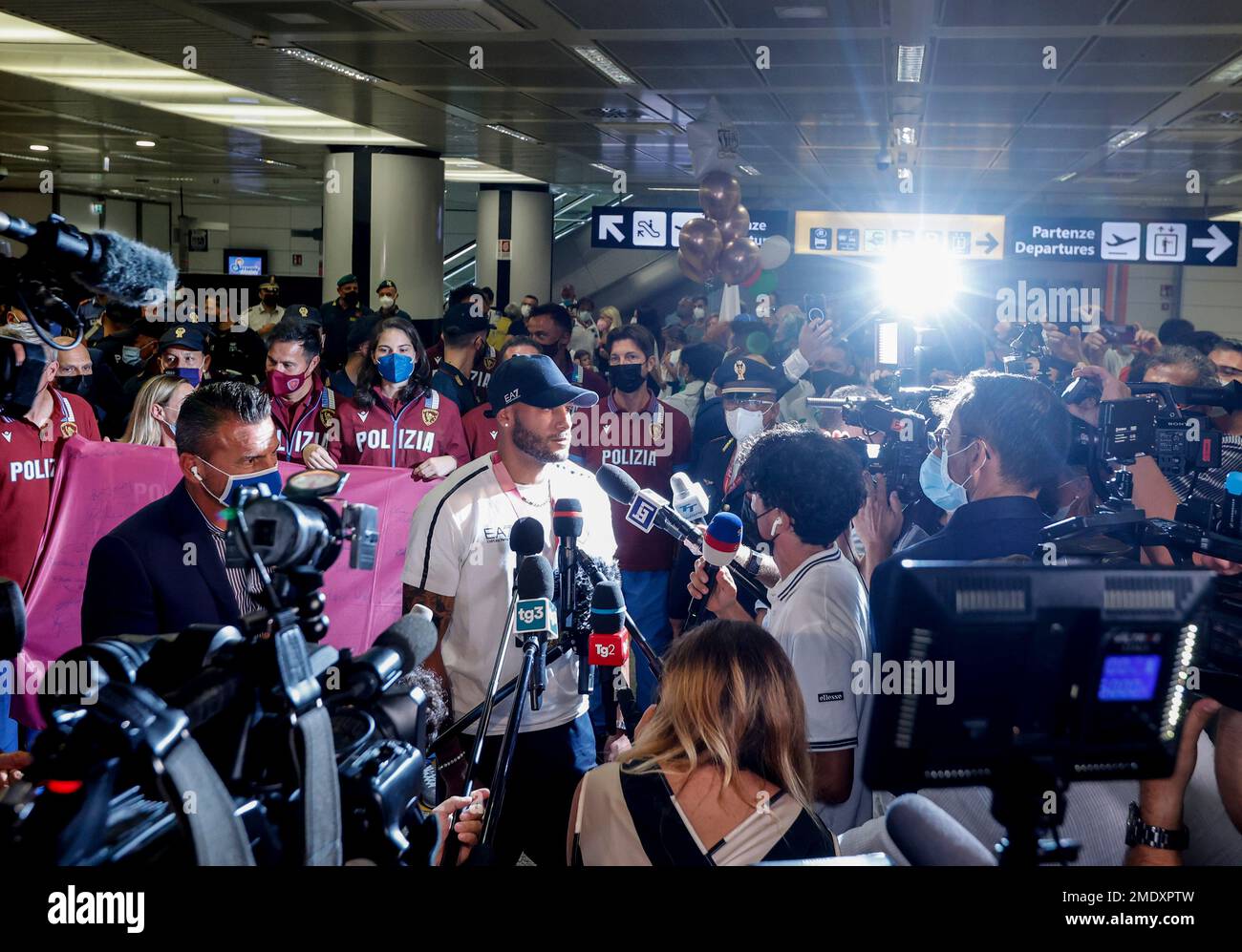 Italian sprinter Marcell Jacobs meets reporters after disembarking from ...