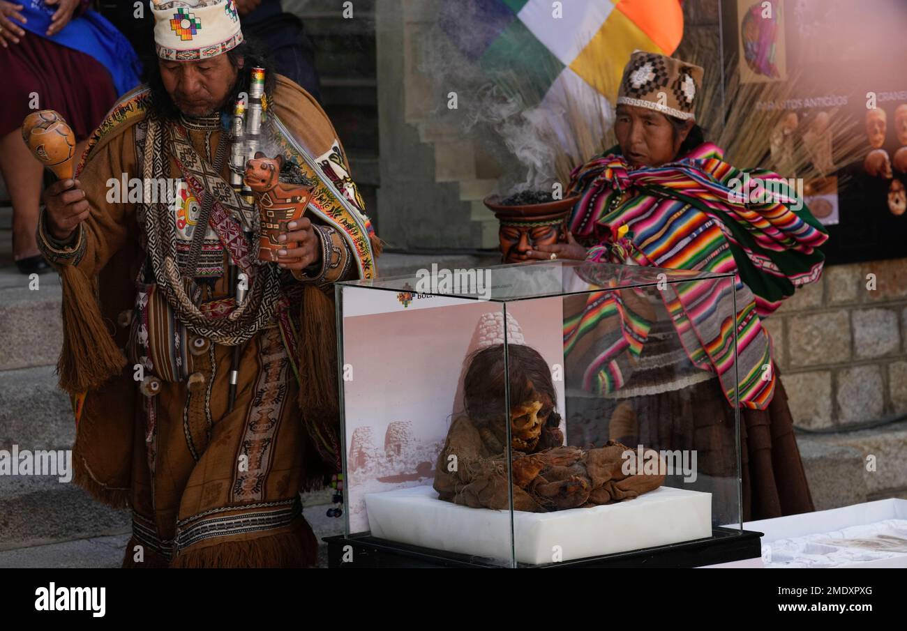 Aymara spiritual guides participate in the naming of the mummy of an ...