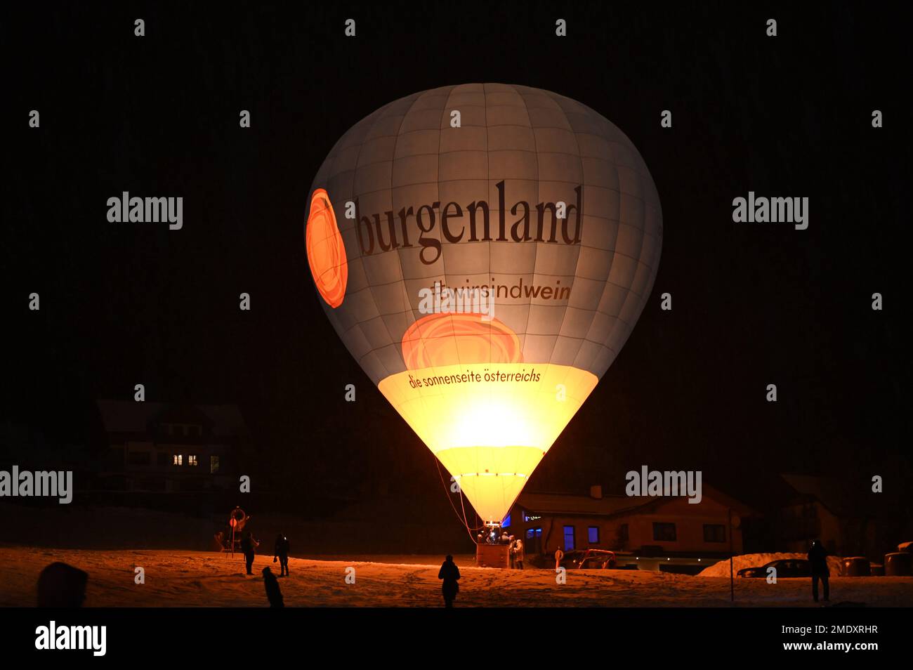 At the night of the balloons, the balloonists fire their balloons on ...
