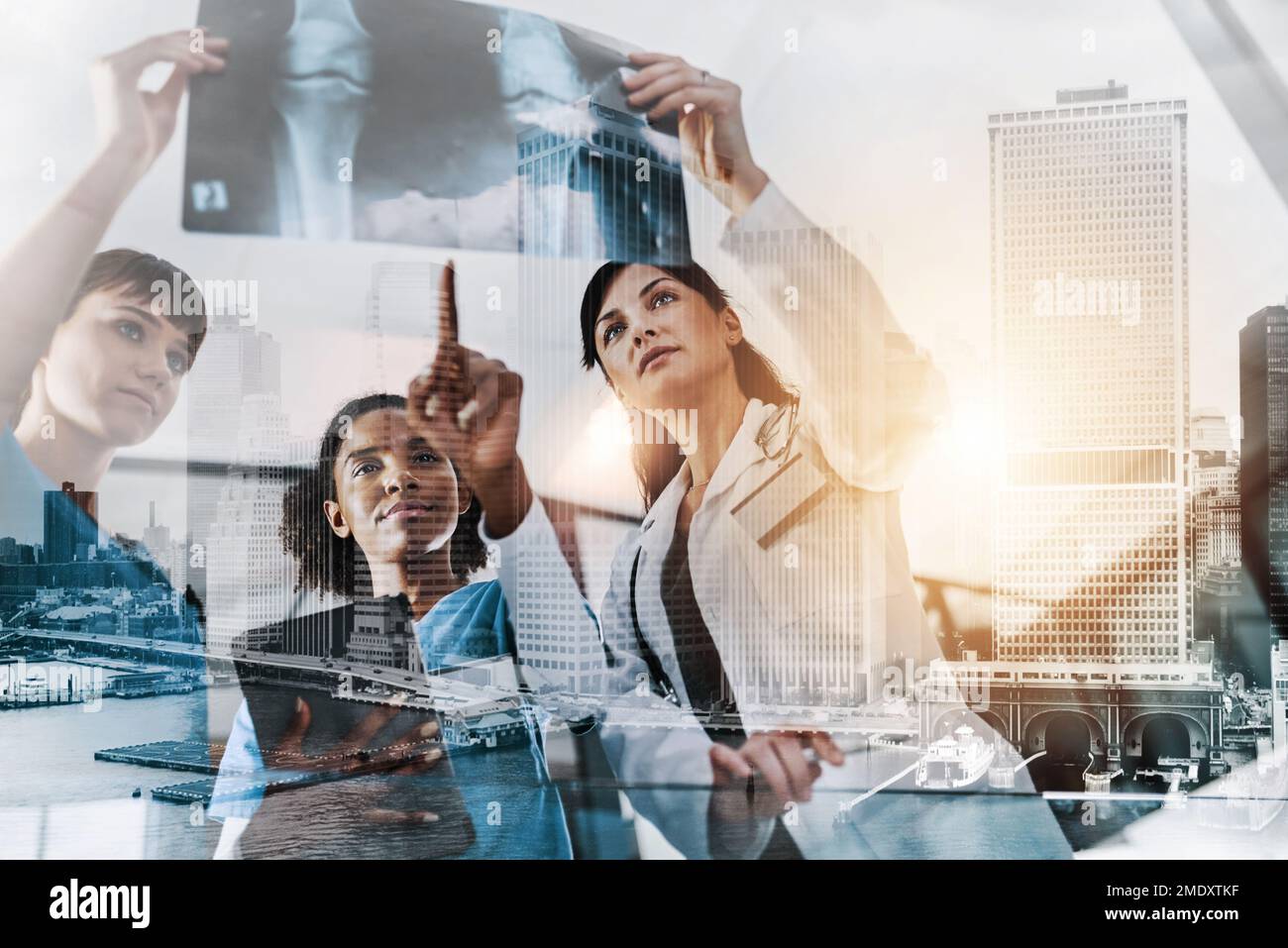 Taking a deeper look into the body. a group of doctors discussing the ...