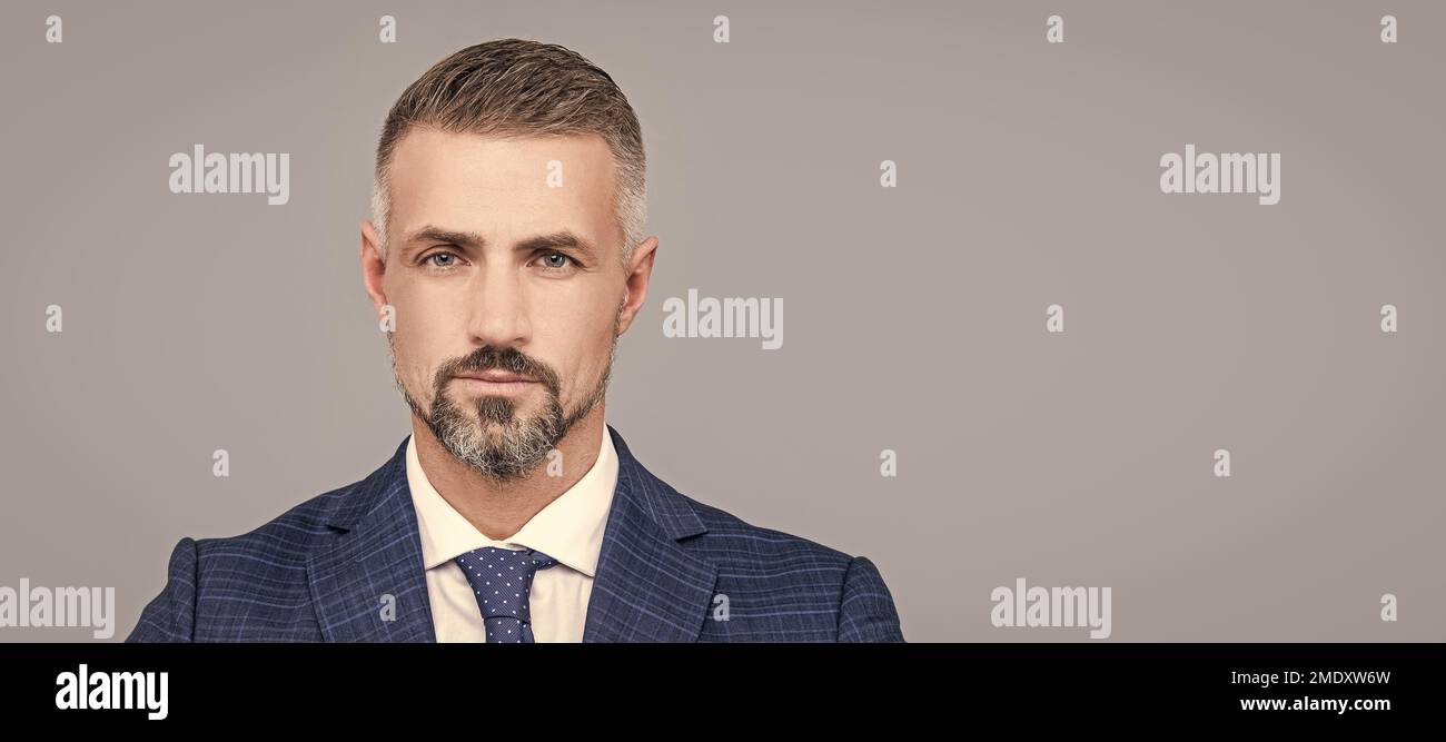 Man face portrait, banner with copy space. grizzled businessman hold ...
