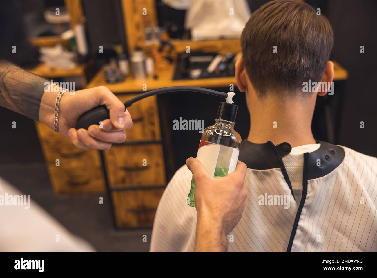 Man spray fragrance hi-res stock photography and images - Alamy