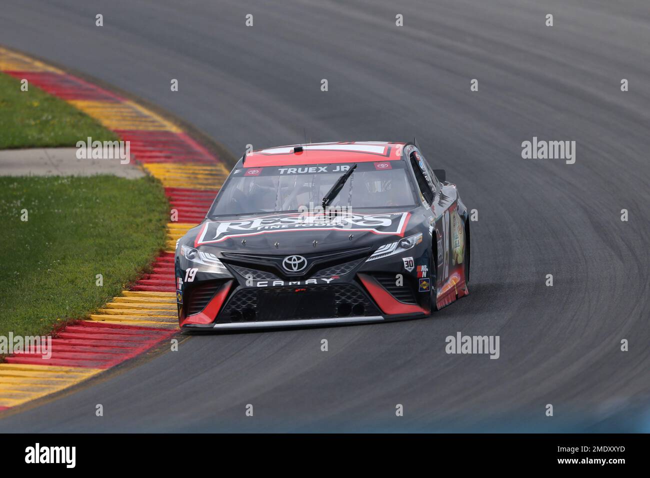 Martin Truex Jr. (19) drives up the esses during a NASCAR Cup Series ...