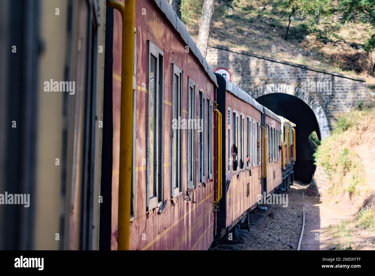 Toy Train moving on mountain slopes, beautiful view, one side mountain ...