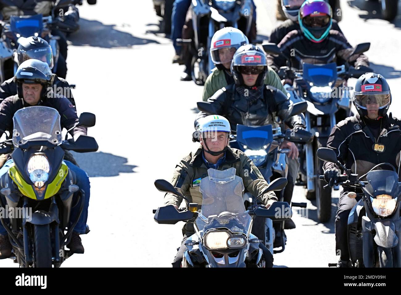 Brazil's President Jair Bolsoanro leads a motorcycle rally with local ...