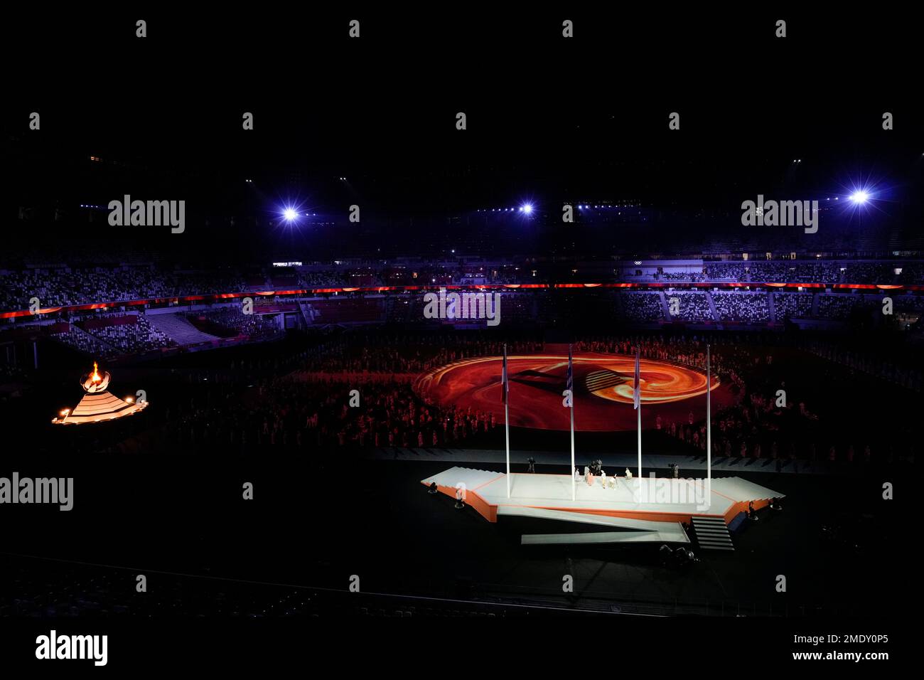 The Olympic flame is extinguished during the closing ceremony in the ...