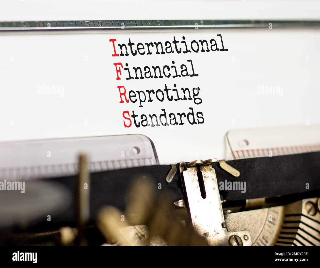 IFRS symbol. Concept words IFRS international financial reporting standards on typewriter on ...