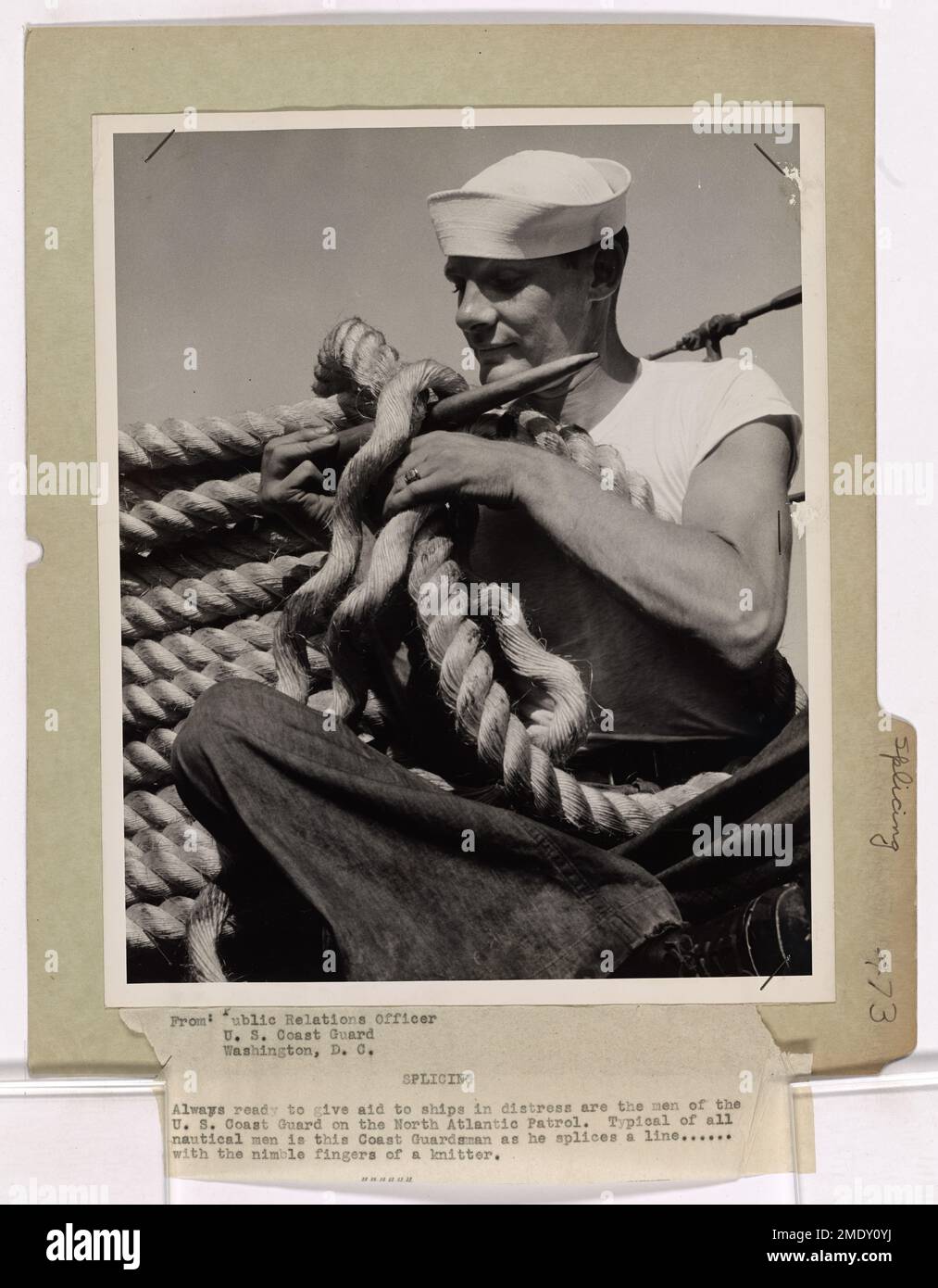 A Coast Guardsman splices a line aboard a ship, a vital skill in ...
