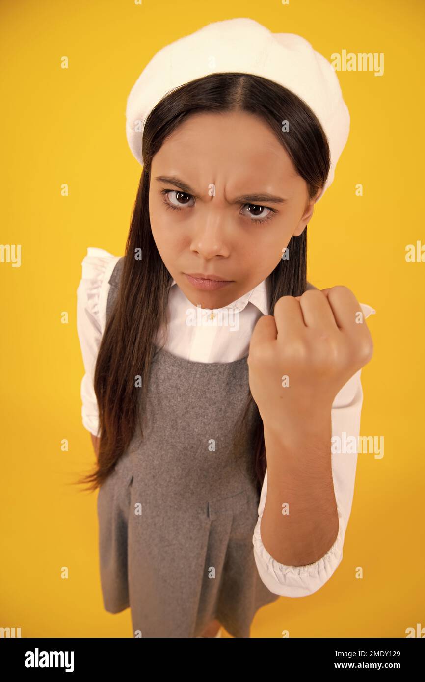 Childhood emotion anger and hate. Teenager girl frowning upset because ...