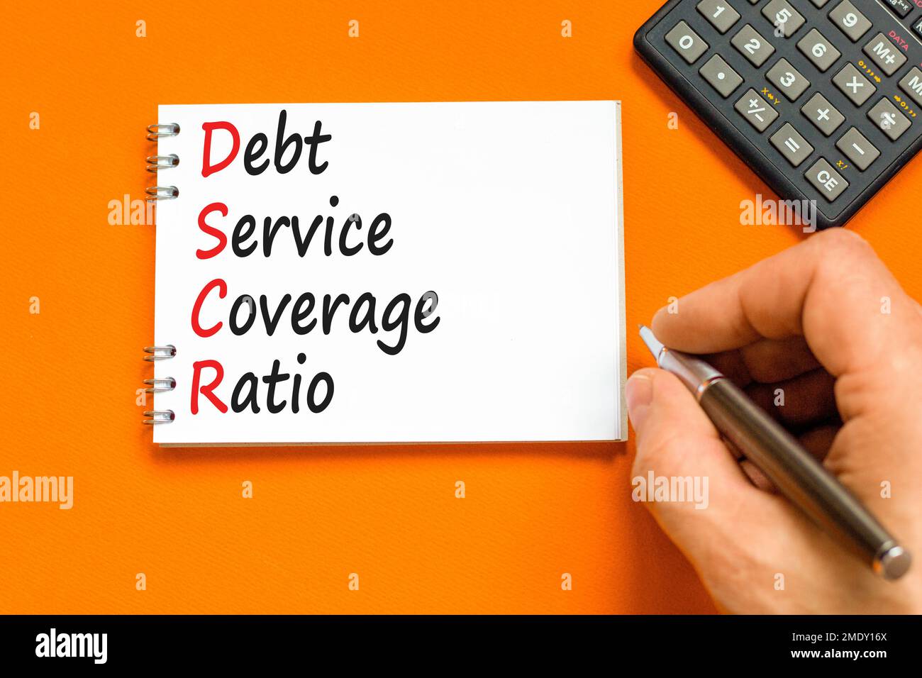 DSCR debt service coverage ratio symbol. Concept words DSCR debt ...