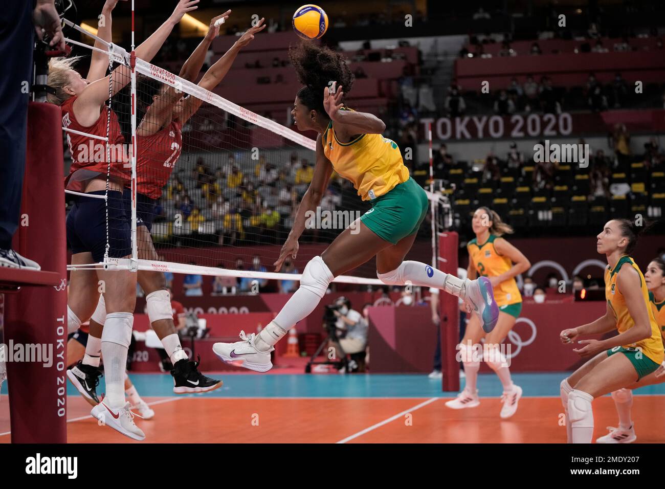 Brazil's Fernanda Rodrigues spikes against the United States during the ...