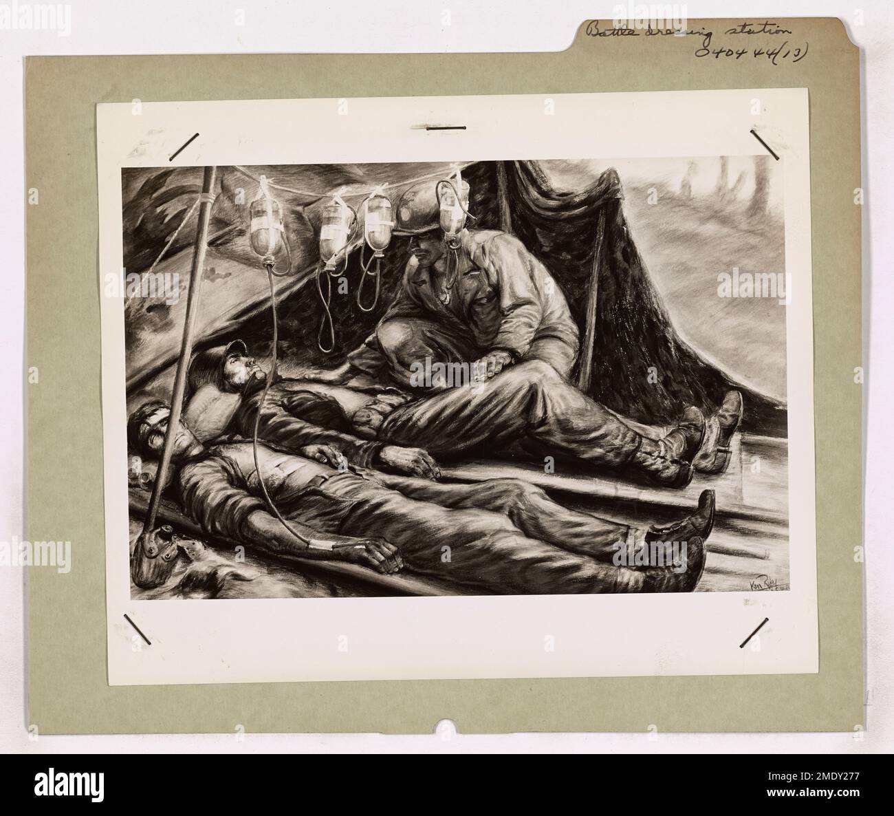 A medical officer assists wounded Marines during the invasion of ...