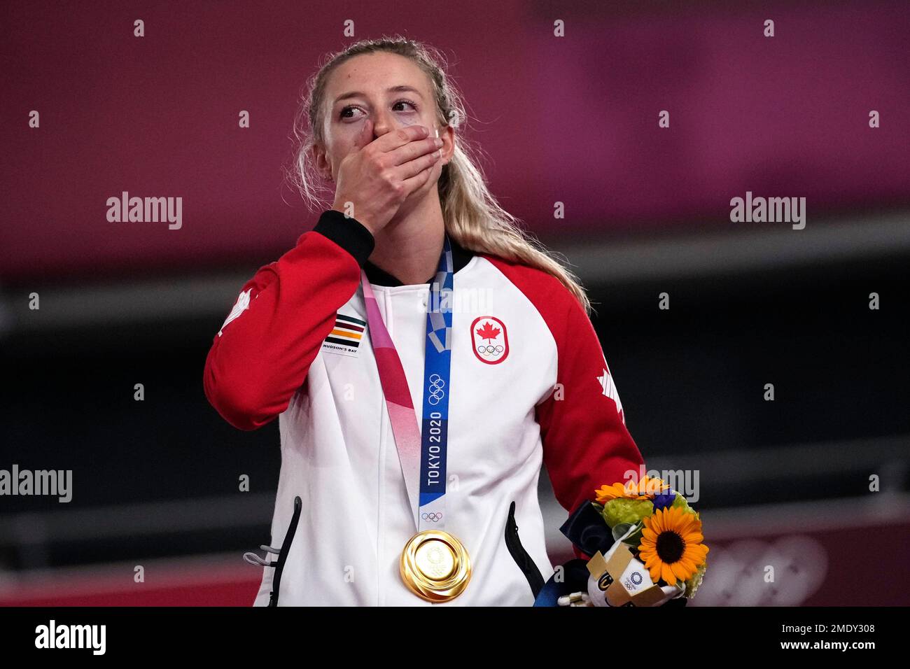 Gold medalist Kelsey Mitchell of Team Canada reacts during a medal ...