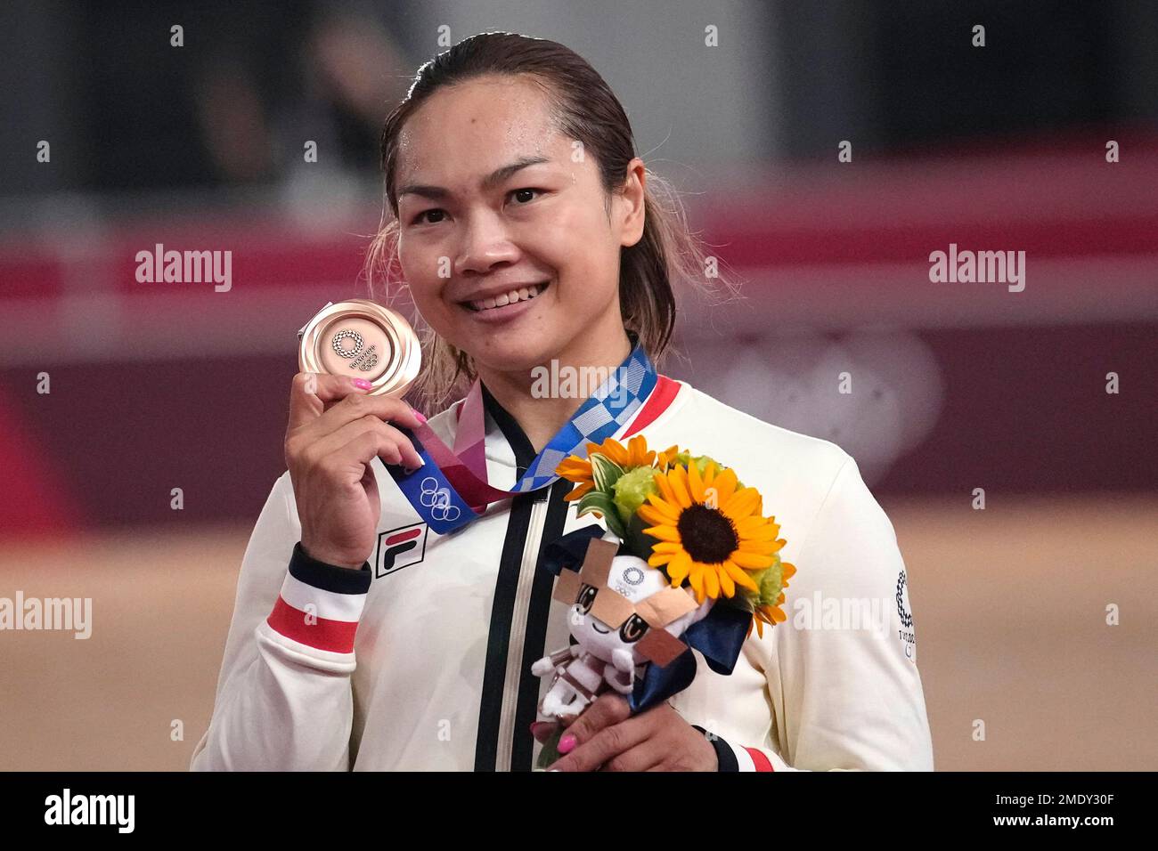 Bronze medalist Wai Sze Lee of Team Hong Kong reacts during a medal ...