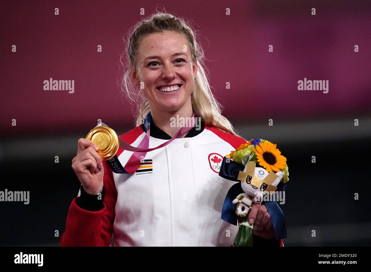 Gold medalist Kelsey Mitchell of Team Canada reacts during a medal ...