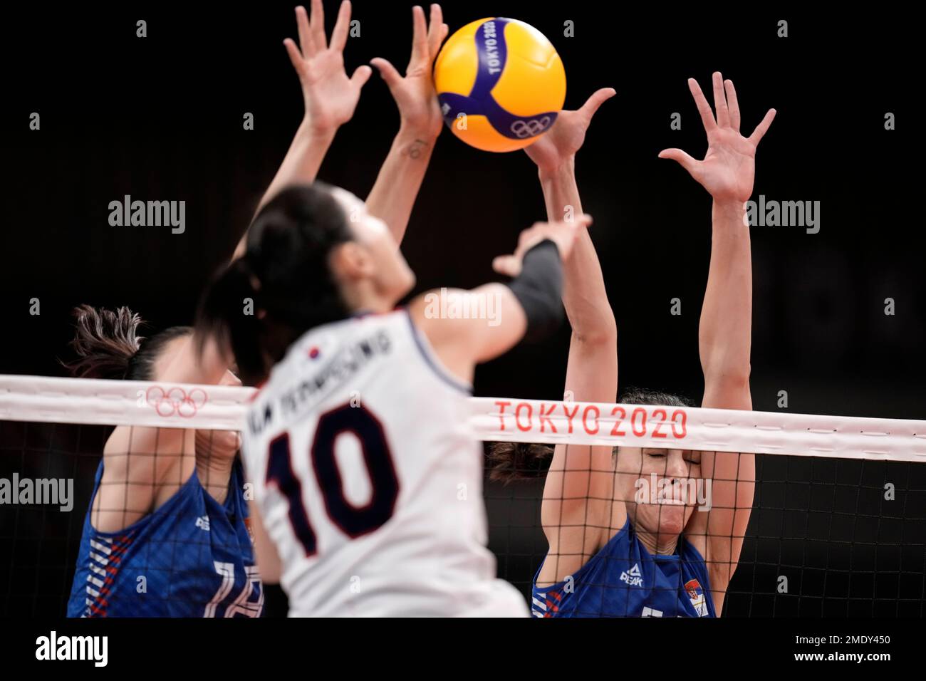 Serbia's Mina Popovic, right, and teammate S Milena Rasic block a shot ...