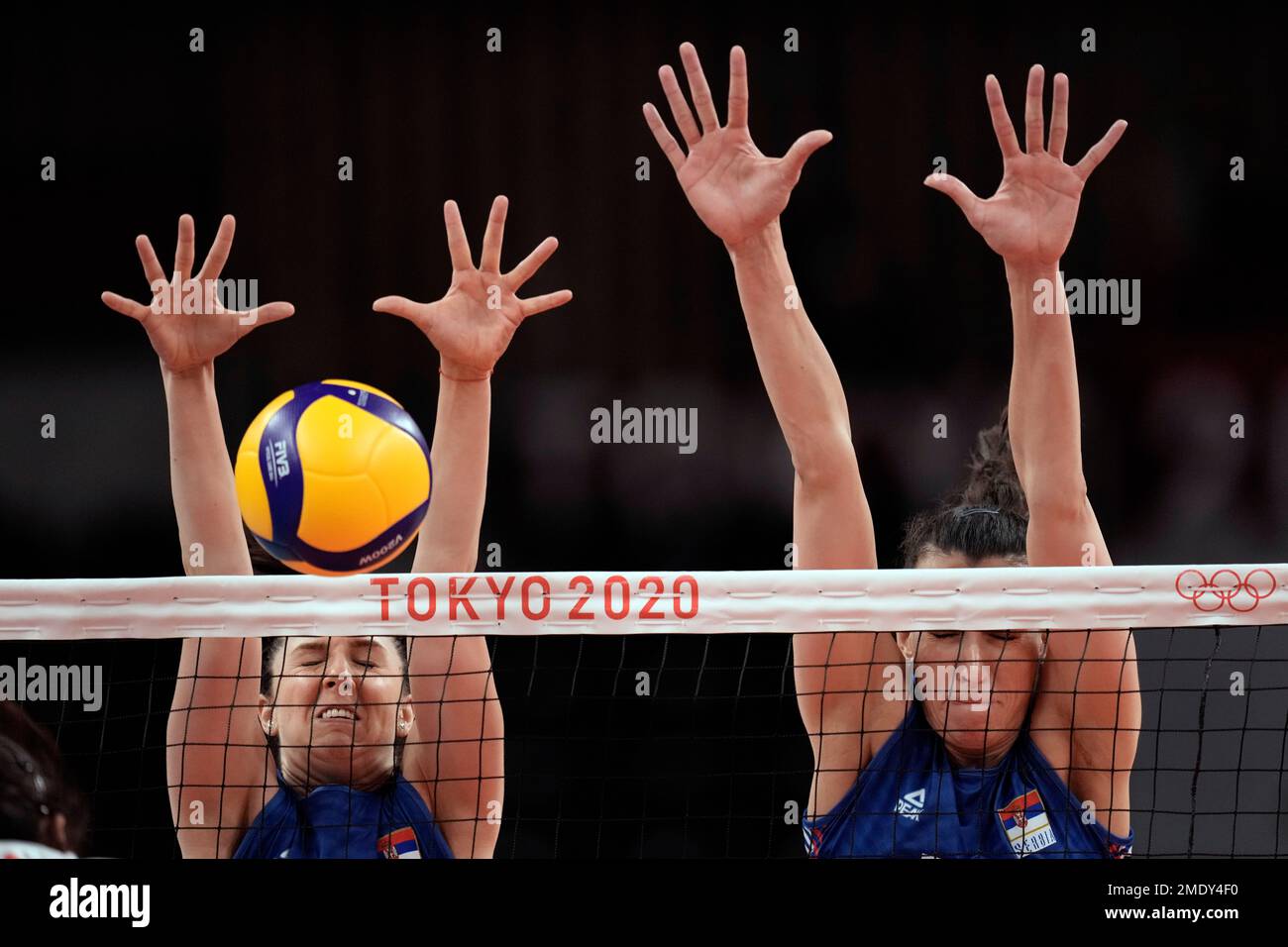 Serbia's Sladjana Mirkovic, left, and Bianka Busa block a shot from ...