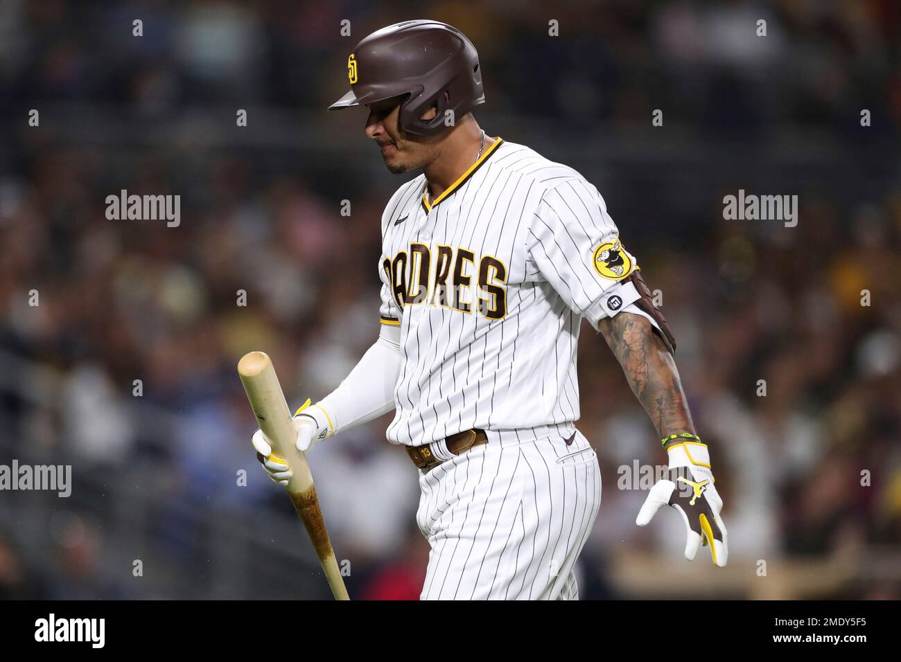 San Diego Padres' Manny Machado reacts after an at bat in a baseball ...