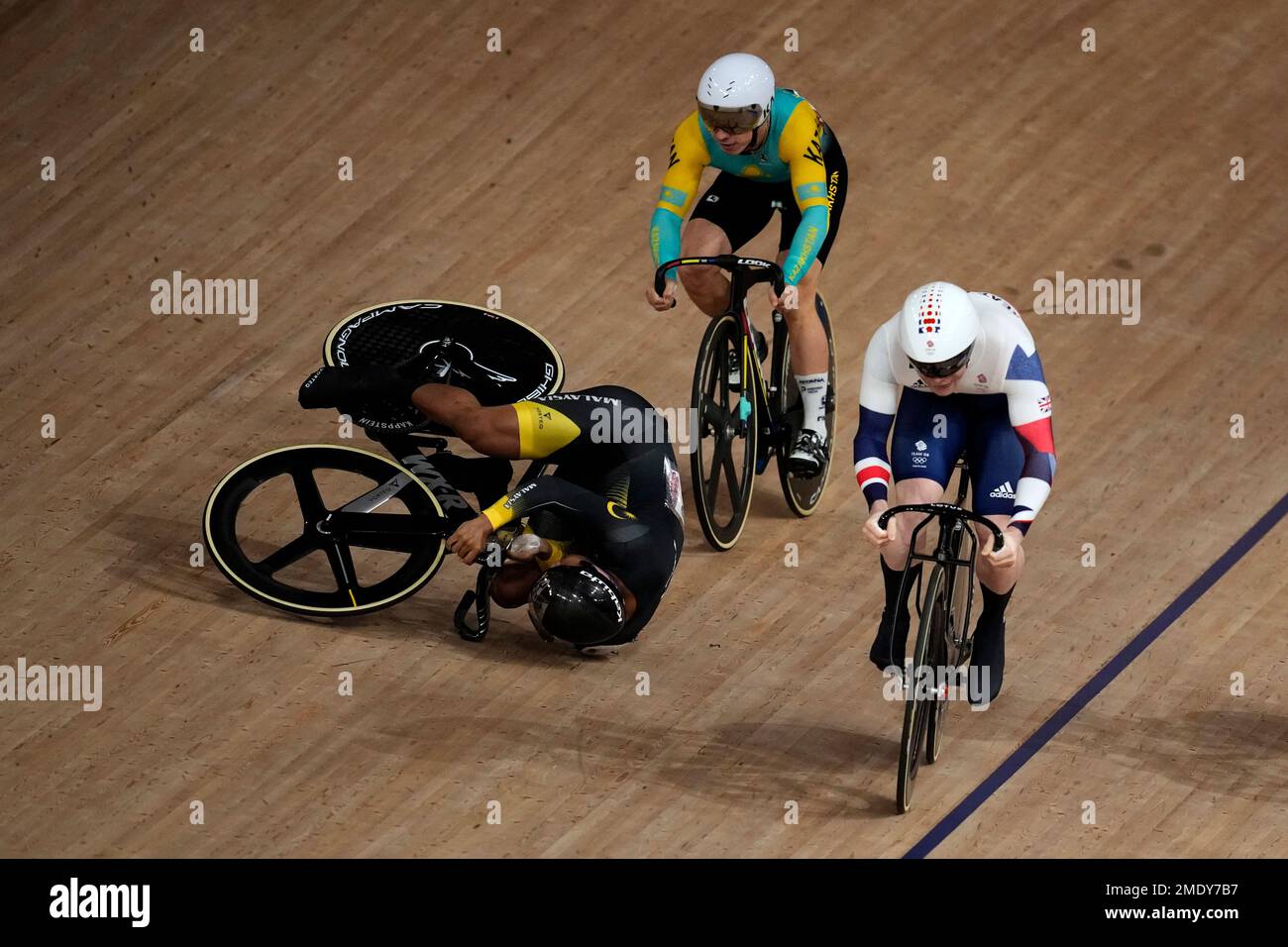 Muhammad Shah Firdaus Sahrom, of Malaysia, crashes during the track ...